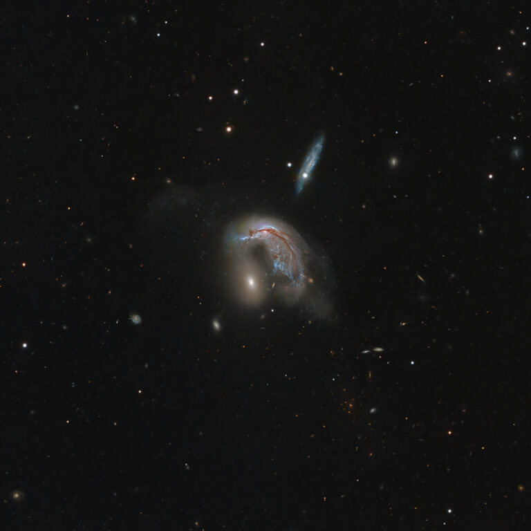 NGC 2936 – Through Light and Time