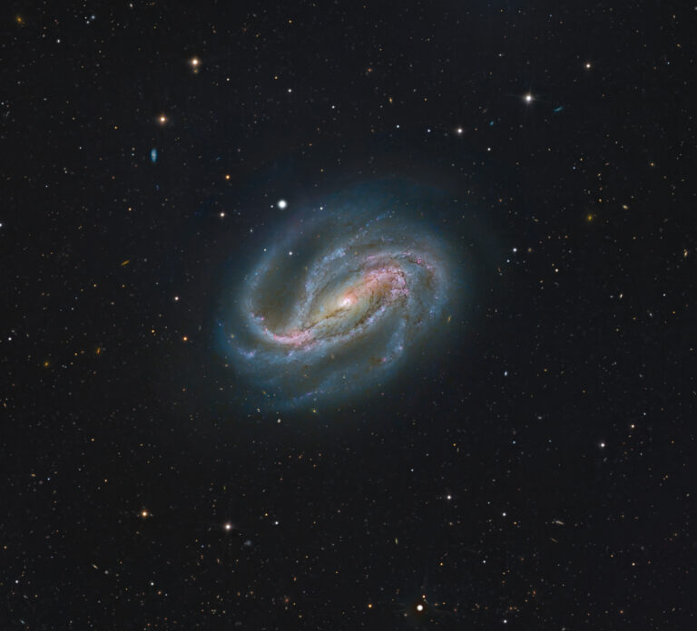 NGC 613 – Through Light and Time
