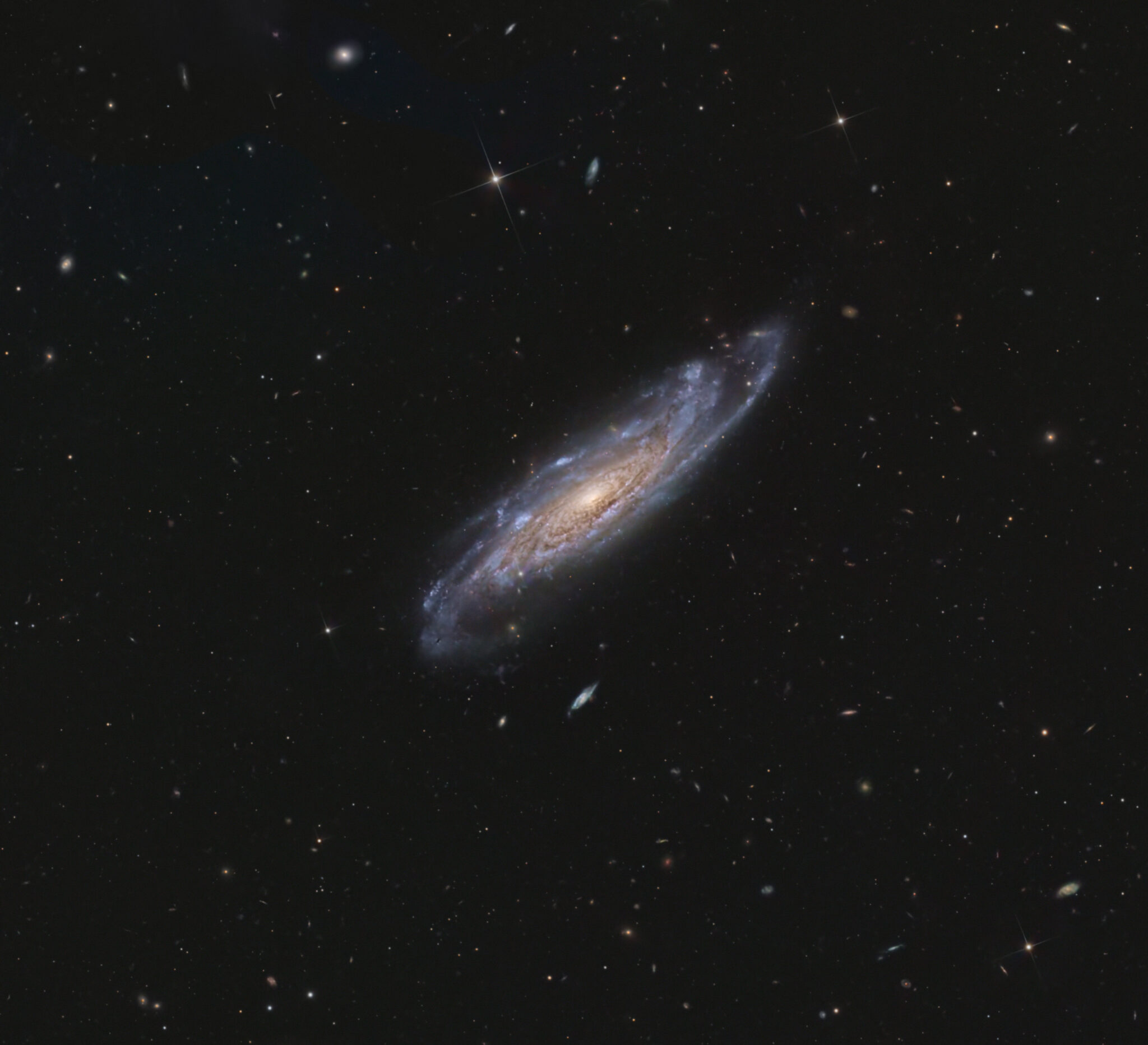 NGC 4705 – Through Light and Time