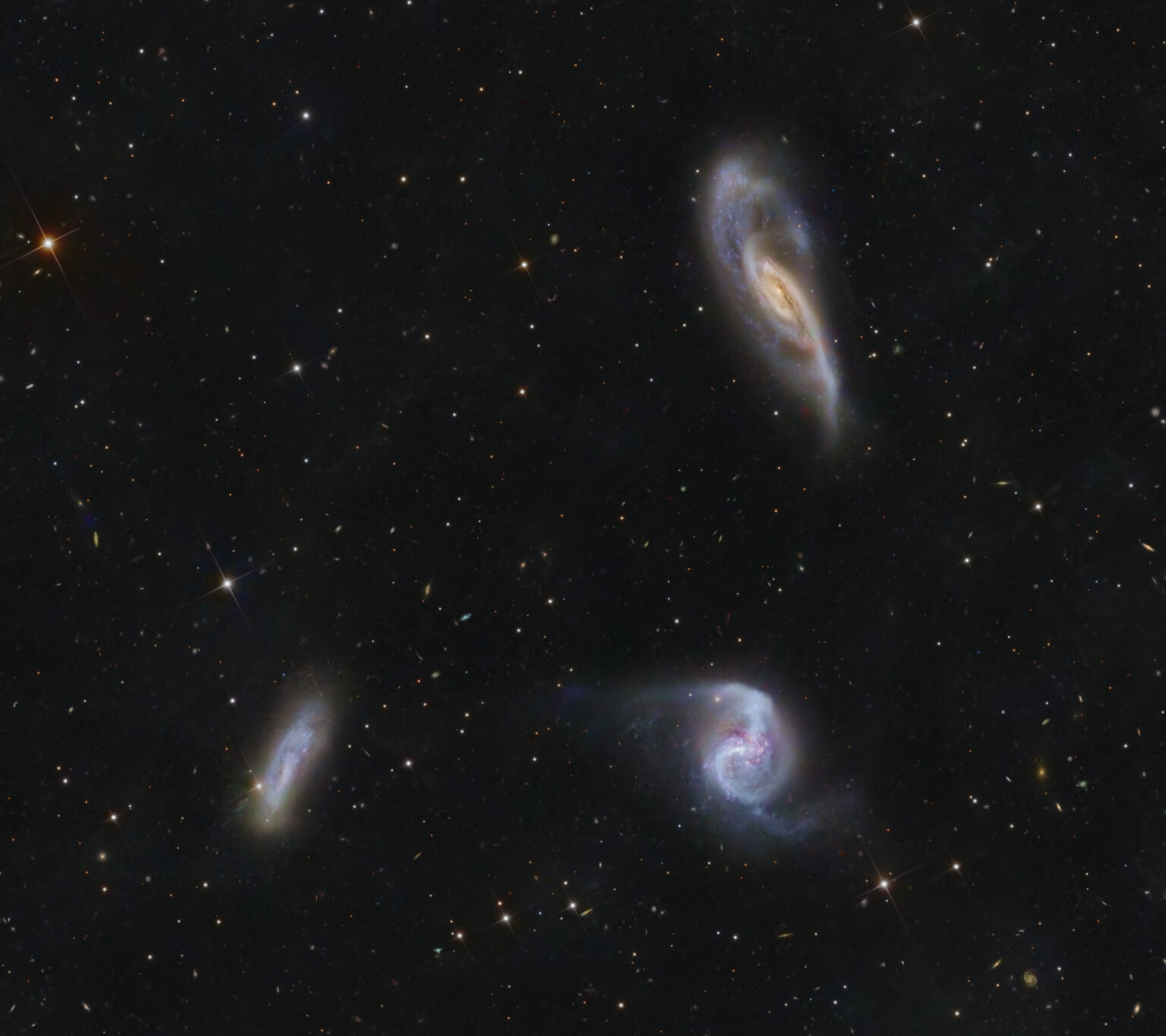 NGC 5916, 5915 and 5916A – Through Light and Time